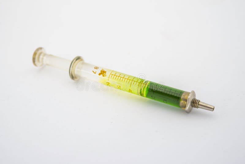 Colored liquid syringe stock photo. Image of medicine - 120217520