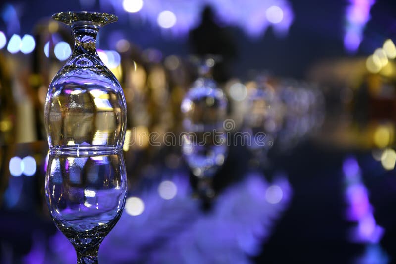 Glass on table stock image. Image of drink, dark, foreground - 135624871