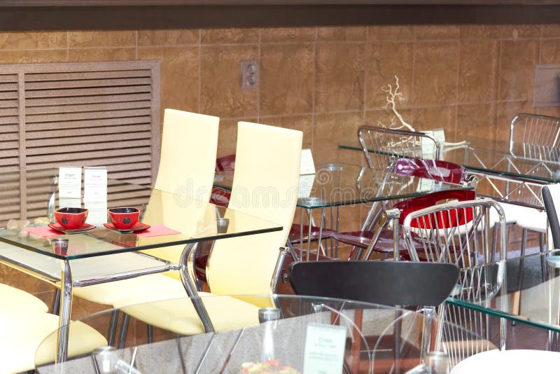 Glass tables and chairs stock image. Image of elegant - 13592639