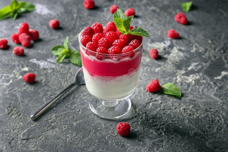 Glass with Tasty Raspberry Dessert on Table Stock Image - Image of ...