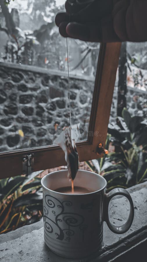 A Glass of Tea in Rainy Day Making Warm Stock Image - Image of glass ...