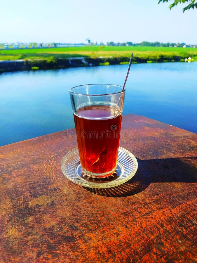 A Glass of Tea in River stock image. Image of drink - 291916005