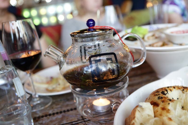 Glass Teapot in the Restaurant Stock Photo - Image of lifestyle, black ...