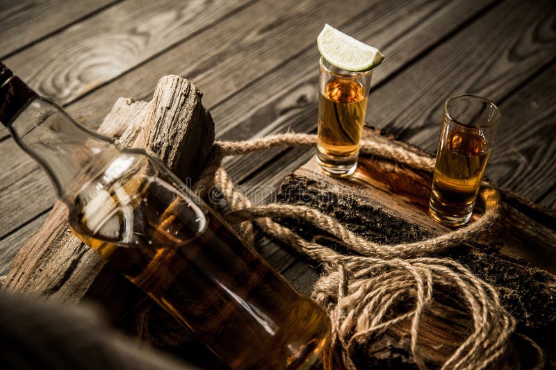 A Glass of Tequila Whiskey, Brandy, Rum on the Bar, a Lot of Alcohol ...