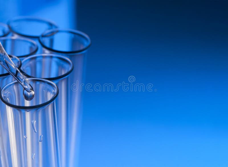 Glass Test Tube with Dropper on Blue Background with Substance Stock ...