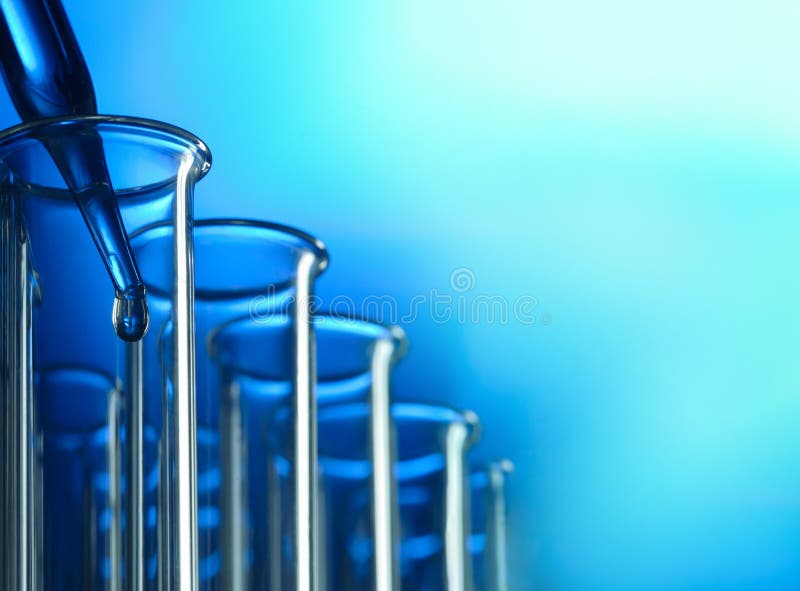 Glass Test Tube with Dropper on Blue Background with Substance Stock ...