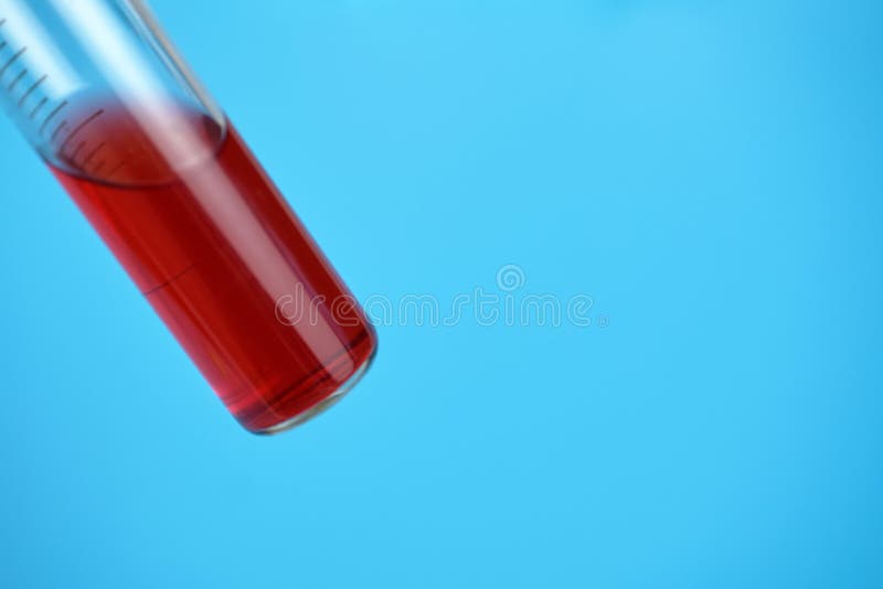 Glass Test Tube with Red Analyzes on a Blue Background Stock Image ...