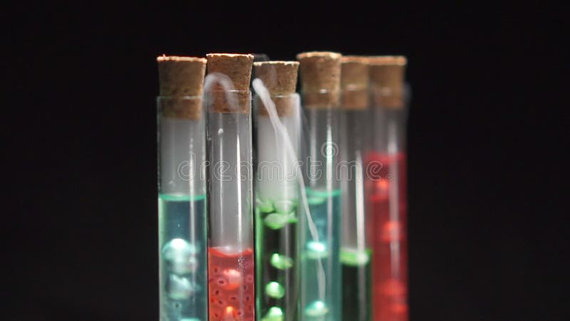 Glass Test Tubes with Boiling Multi-colored Liquid. Stock Footage ...