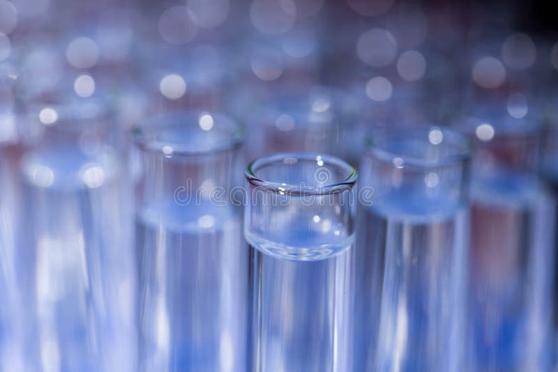 Glass test tubes stock image. Image of orange, industry - 268917383