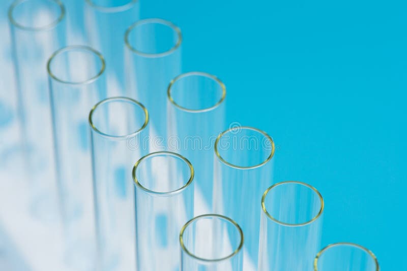 Glass Test Tubes in a Stand on Blue Background Stock Photo - Image of ...