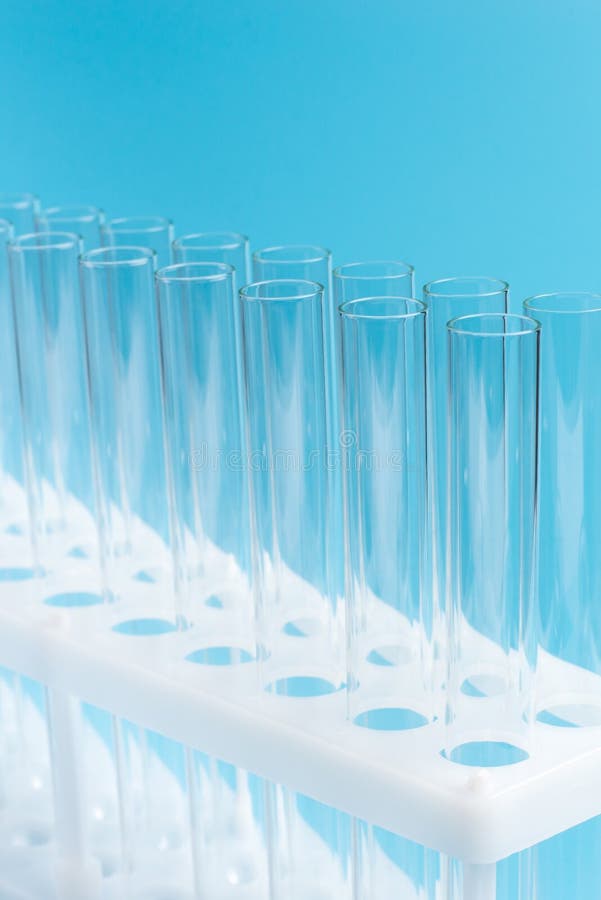 Glass Test Tubes in a Stand on Blue Background Stock Image - Image of ...