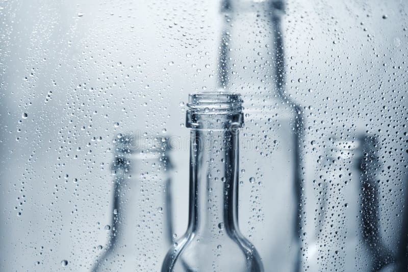 Glass Transparent Bottles in Water Drops Stock Image - Image of bottles ...