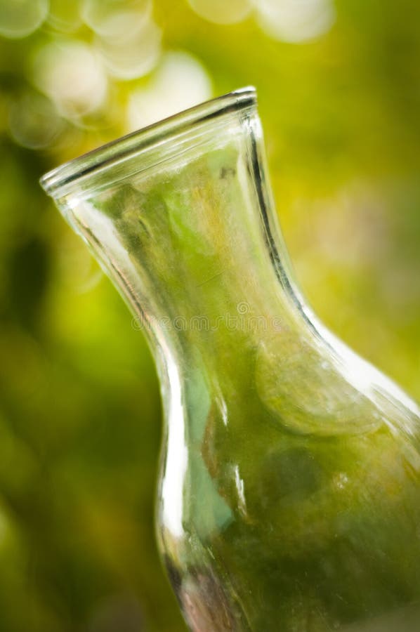 Glass Vase on a Green Background. Shallow DOF. Stock Image - Image of ...