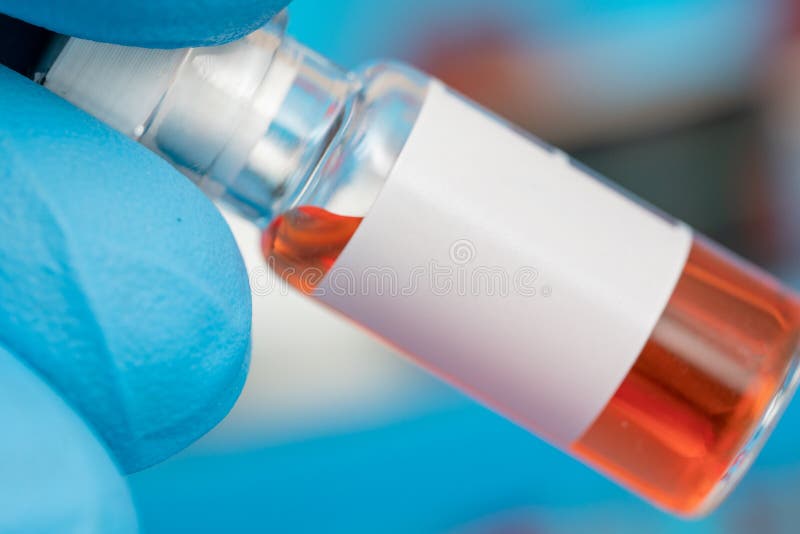 Glass vial with red liquid stock photo. Image of medicine - 281291554