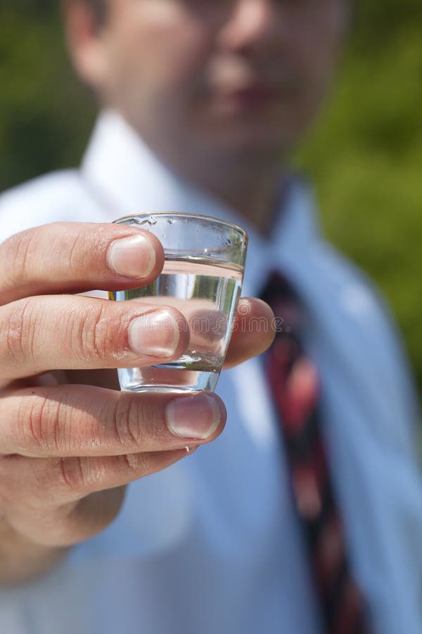 Glass of vodka. stock photo. Image of holding, cool, alcohol - 25121590