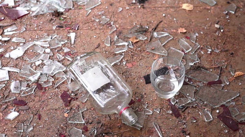 Falling Bottle of Vodka on the Floor Stock Video - Video of destroyed ...