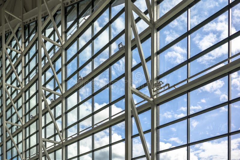 Glass Wall with Metal Support Structure with Cloudy Sky Outside Stock ...