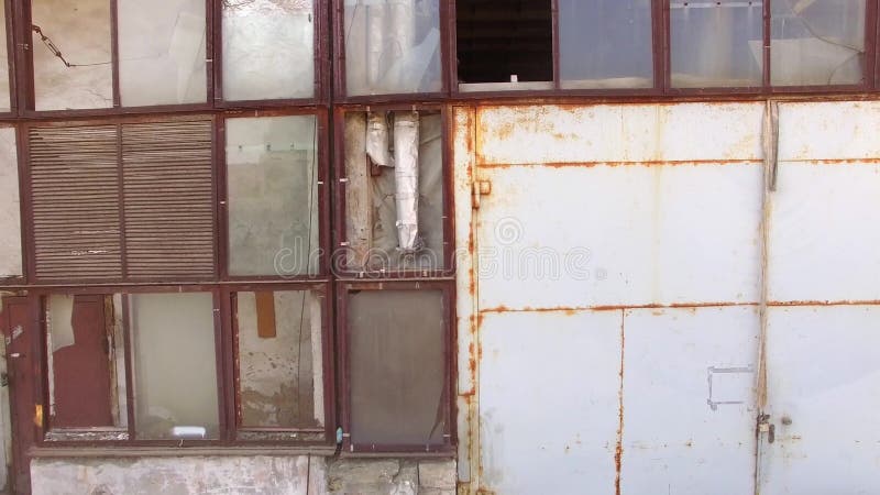 Glass Wall of a Building with Broken Windows Stock Footage - Video of ...