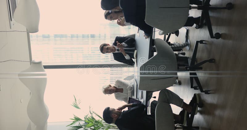 Through Glass Wall View of Business Team Talking at Table Stock Video ...