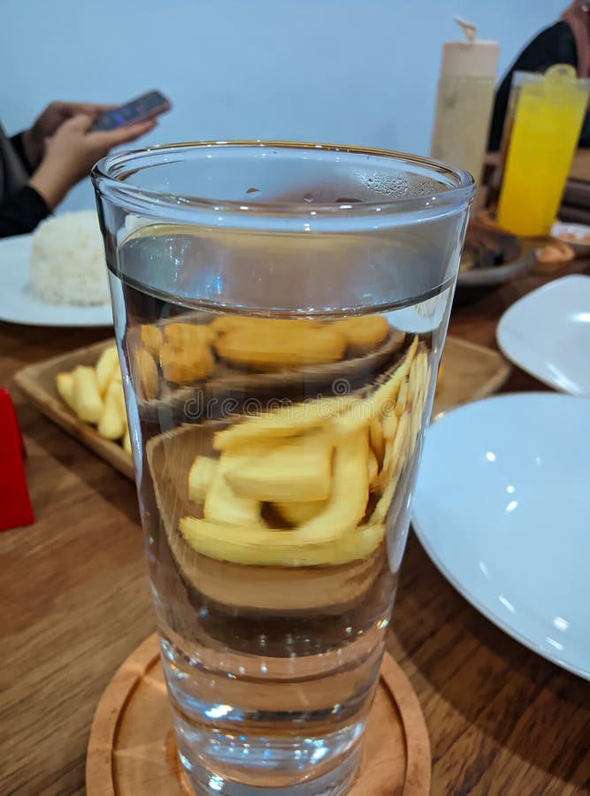 A Glass of Warm Water on the Table Stock Photo - Image of warm, glass ...