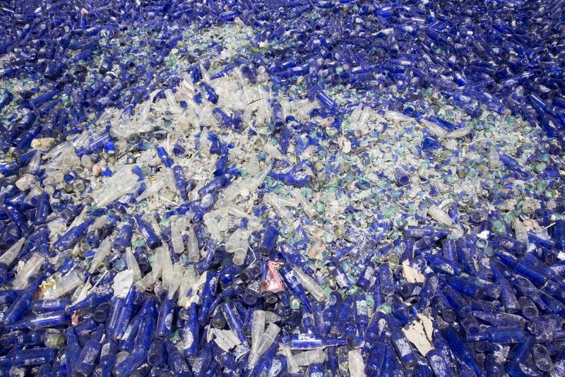 Glass Waste in Recycling Facility. Blue Bottles Editorial Stock Photo ...