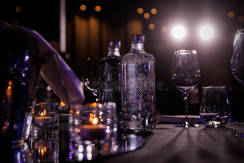 The Glass Water Bottle on the Restaurant Table Stock Image - Image of ...