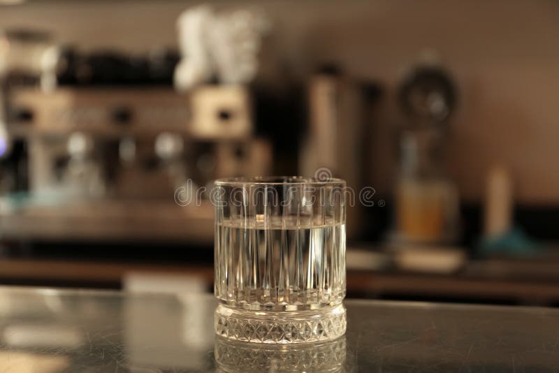 Glass with Water on Countertop in Cafe Stock Image - Image of cafeteria ...