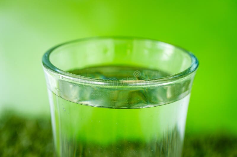 Glass of Water among the Greenery, Environmental Concept, Problem with ...