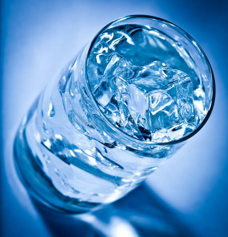 Glass of water with ice stock image. Image of water, frozen - 18313477