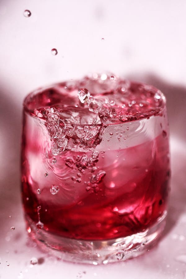Red Splashes in the Glass of Water Stock Image - Image of krople ...