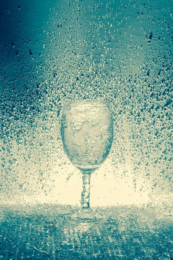 Glass with Water splash stock image. Image of bottle - 38874209