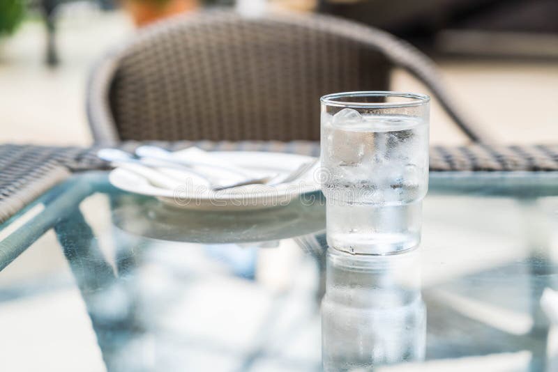 A glass of water on table stock image. Image of table - 96189781