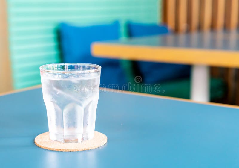 Glass of water on table stock photo. Image of beverage - 155910868