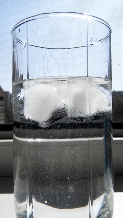 A Glass of Water in Which Ice Floats Stock Photo - Image of science ...