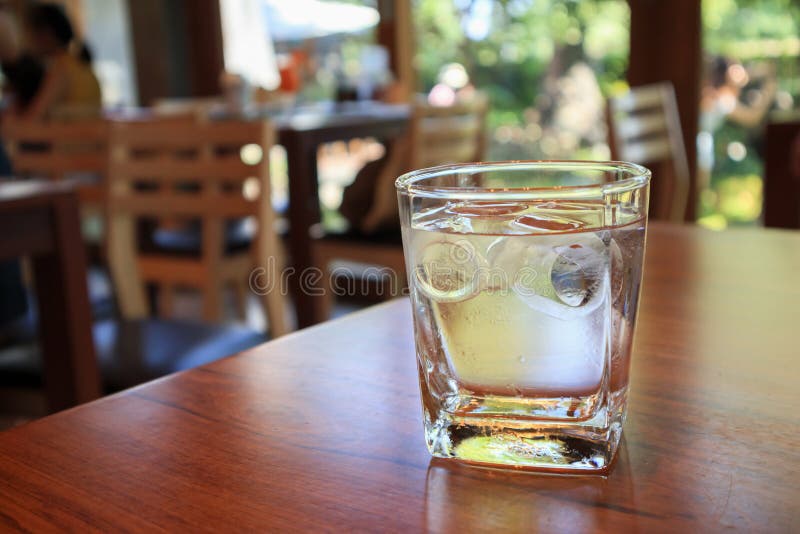 Glass of Water on Wood Table in Restaurant Stock Image - Image of fresh ...
