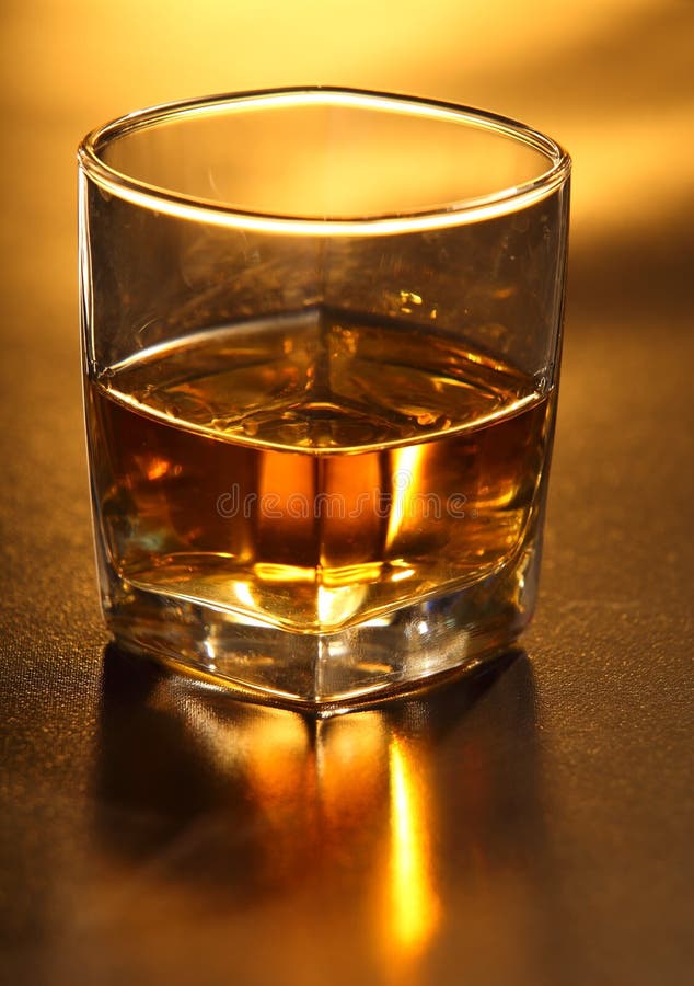 Glass of whiskey stock photo. Image of golden, alcohol - 12269524