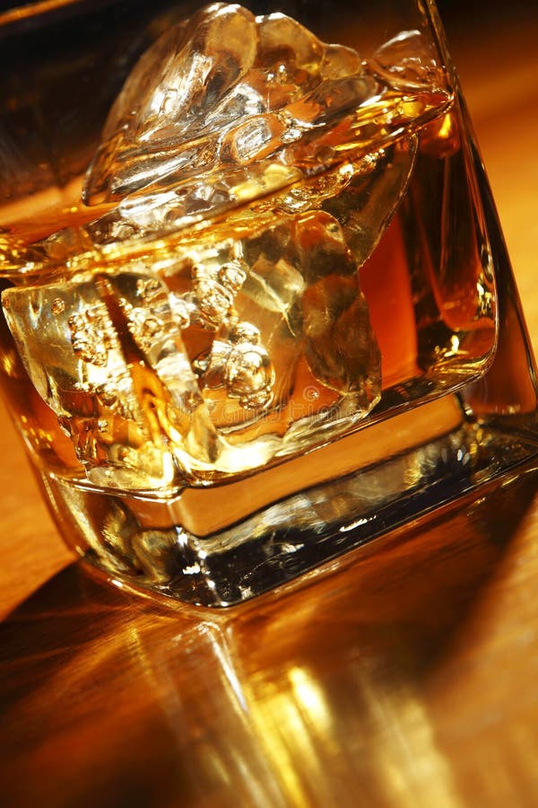 Pouring Whiskey in Glass with Ice Stock Image - Image of glass, liqour ...