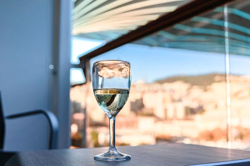 Glass of White Wine on Table in Sunlight. Atmosphere of Delightful ...