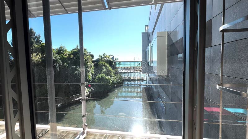 Glass Window Bridge Over Blue Water Inside a Modern Museum Stock ...