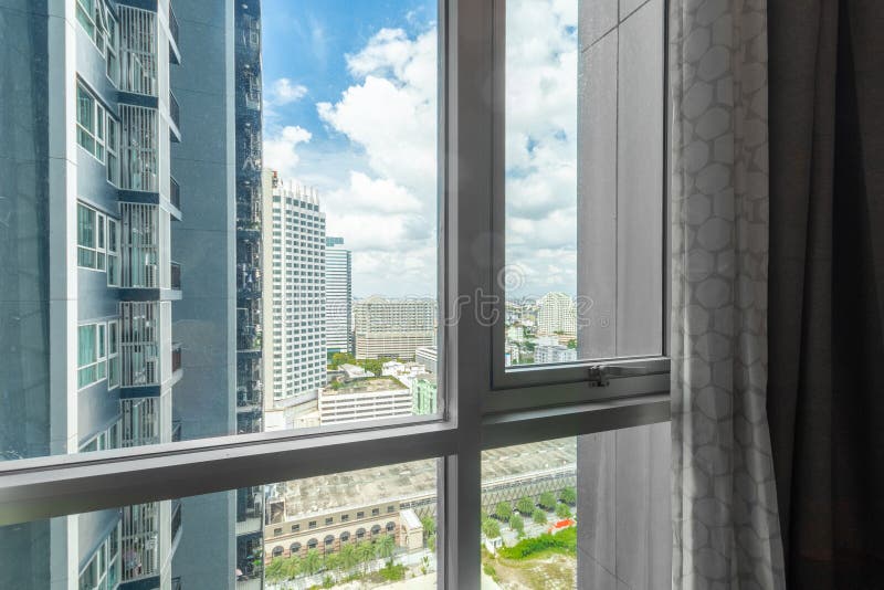 Glass Windows in High-rise Condos Offer Views of Buildings Stock Image ...