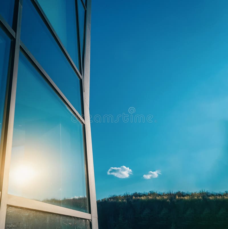 Glass Windows of a Modern Building. Sunlight is Reflected in the Glass ...
