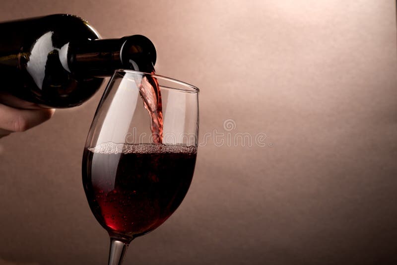 Glass of Wine Being Poured from a Bottle . Stock Image - Image of pour ...