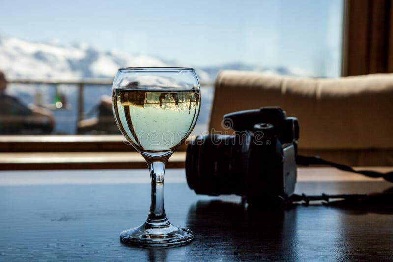 A Glass of Wine and a Camera Stock Image - Image of time, evening ...