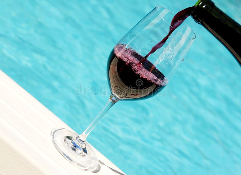 Glass of Wine by the Pool stock photo. Image of wineglass - 3132062