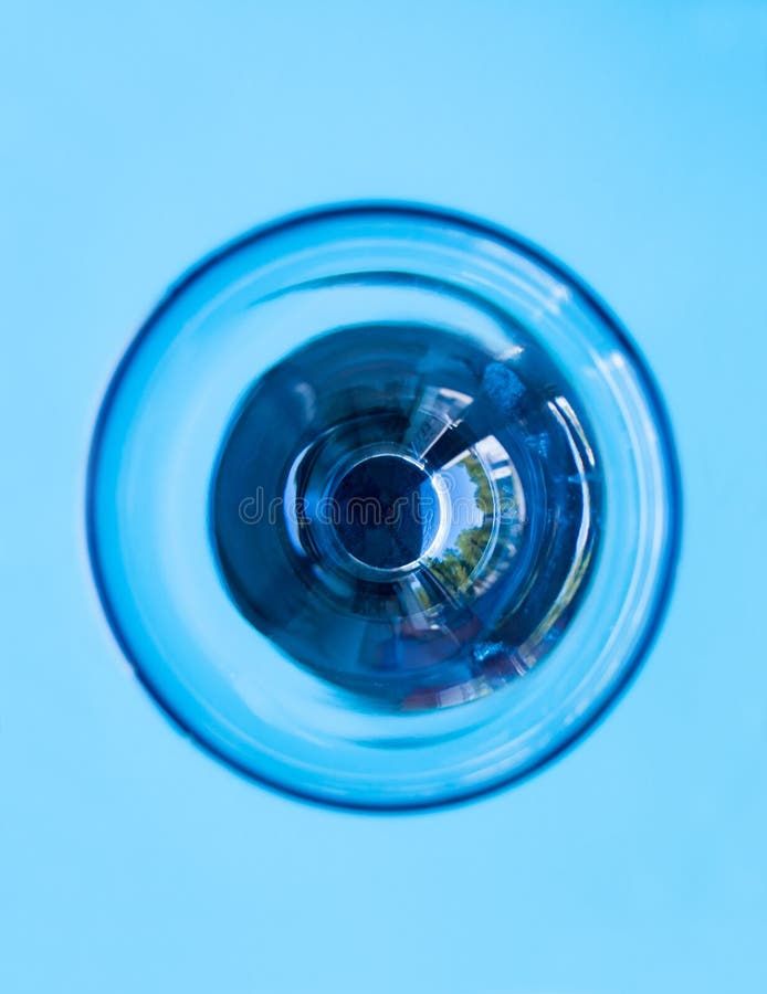 Glass Wineglass with Reflections on Blue Background. View from Above ...