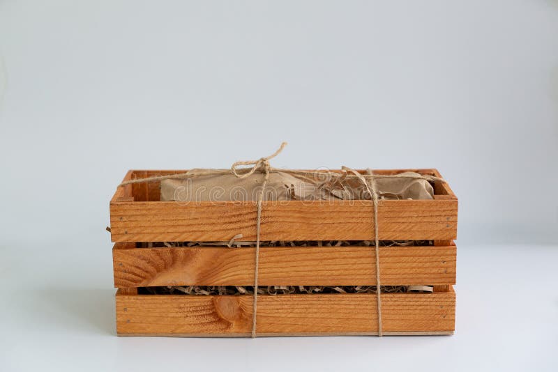 Glass Wrapped in Craft Paper in a Wooden Box Stock Photo - Image of ...