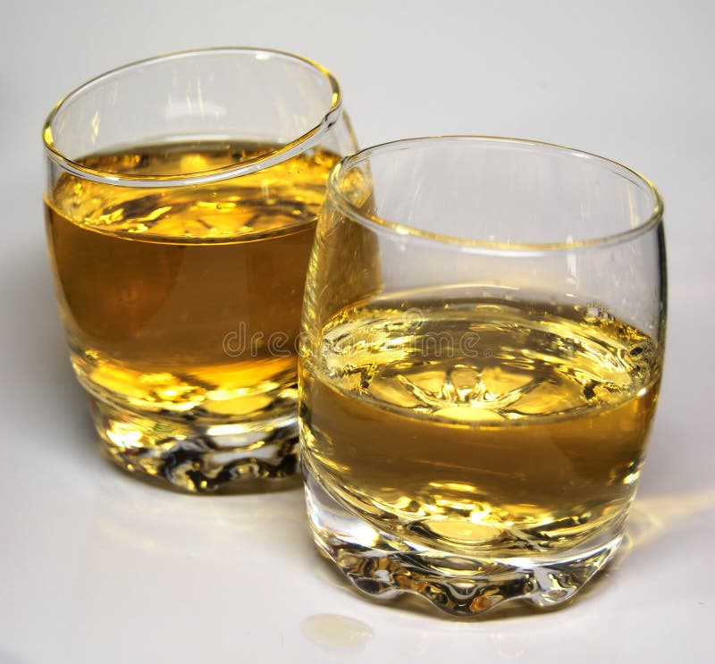 Glasses with an Amber Drink Stock Photo - Image of objects, gold: 11258676