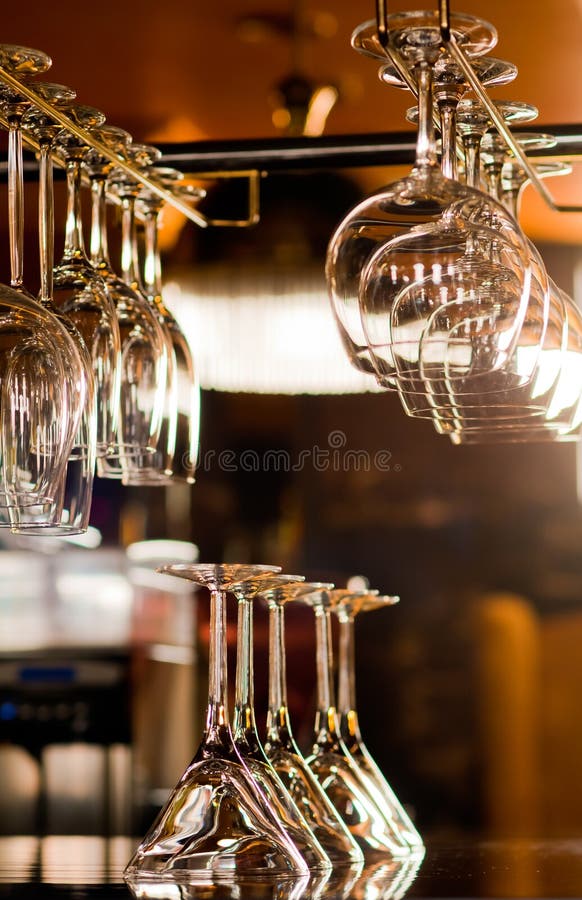 Glasses on bar counter stock image. Image of crowd, glass - 18495661