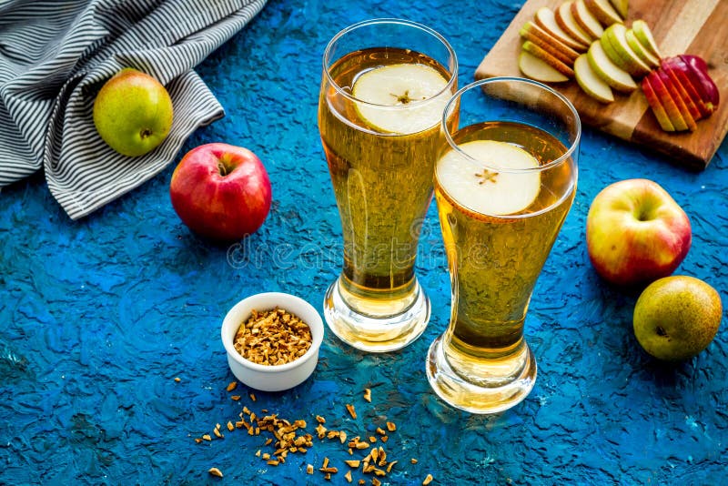Glasses of Beer with Apple and Peer on Blue Desk Stock Image - Image of ...