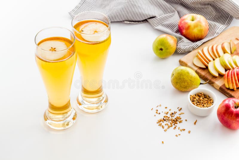 Glasses of Beer with Apple and Peer on White Desk Stock Image - Image ...
